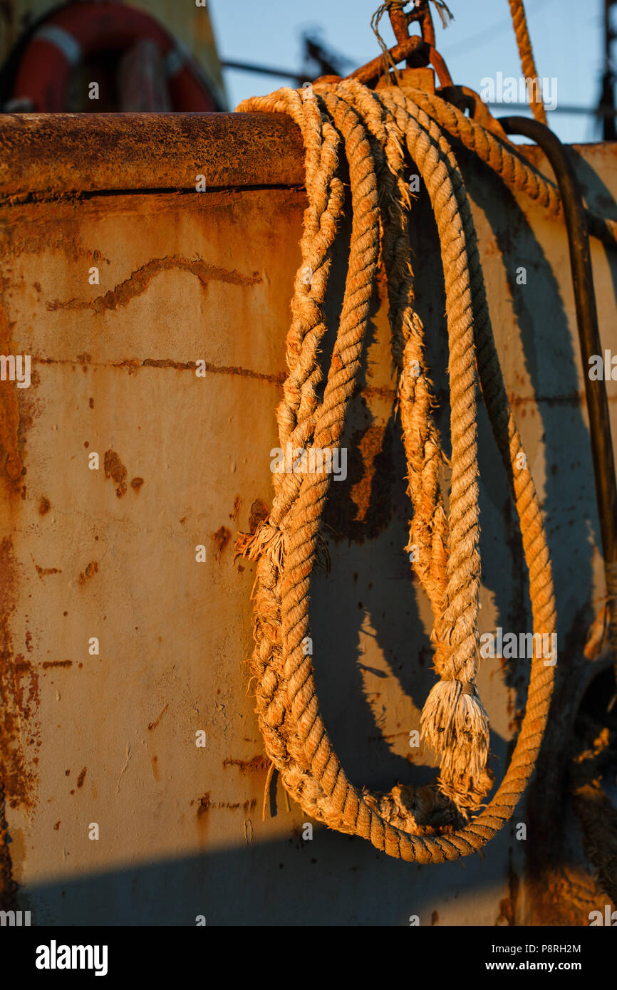 Old ropes rust on old ship. Rope sling Stock Photo - Alamy