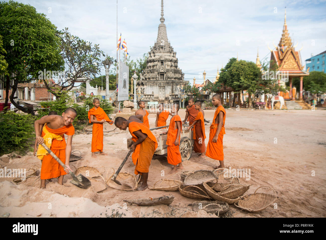 Young monks working hi-res stock photography and images - Alamy