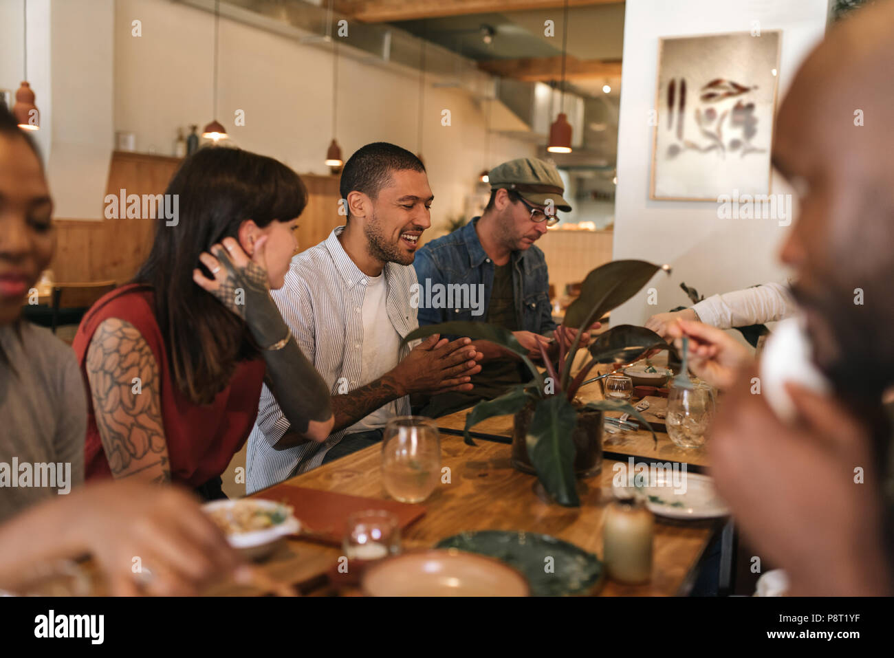 Friends having a meal together hi-res stock photography and images - Alamy