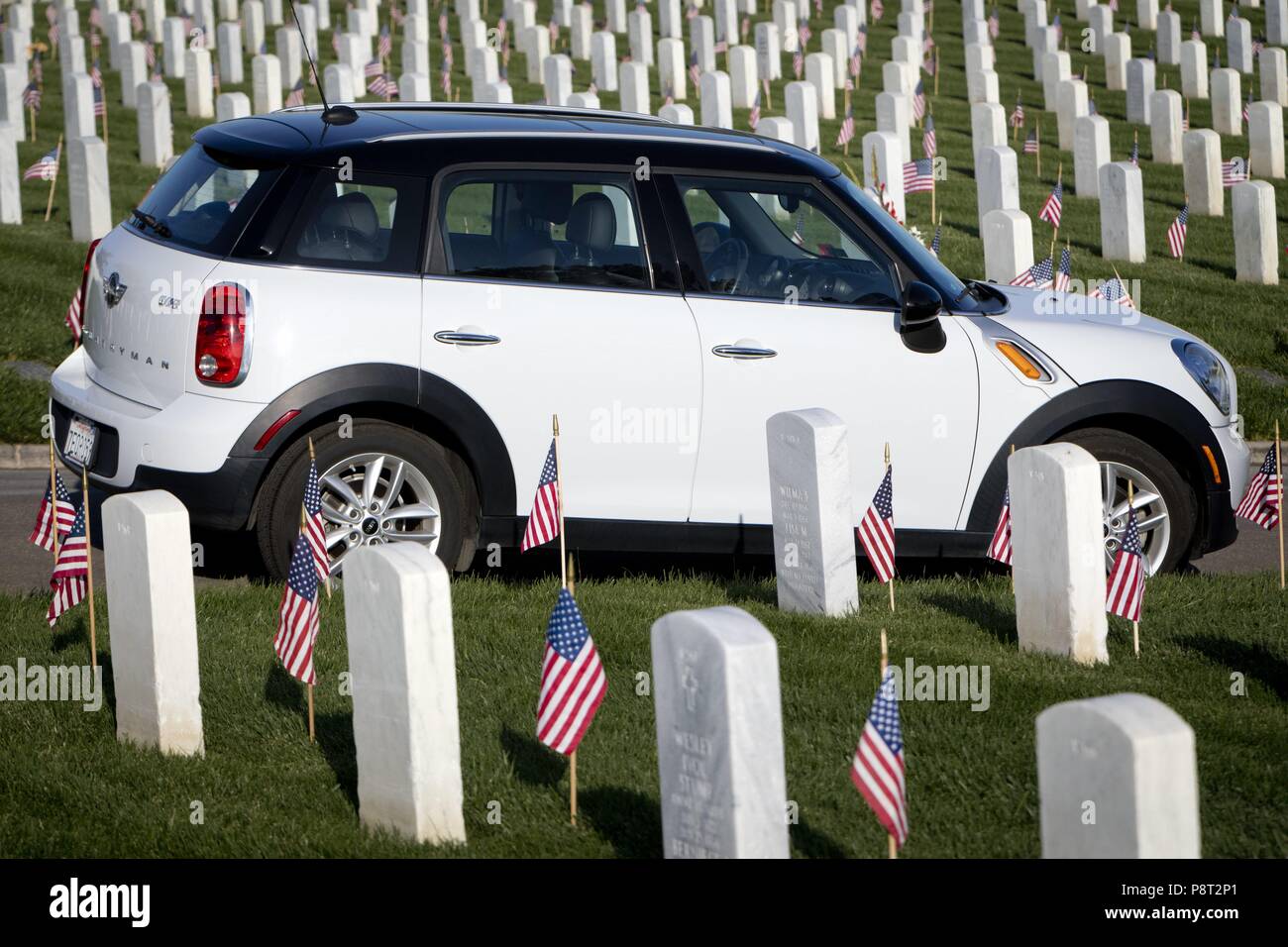 A Mini Cooper Countryman in the midst of tombstones decorated with Star ...