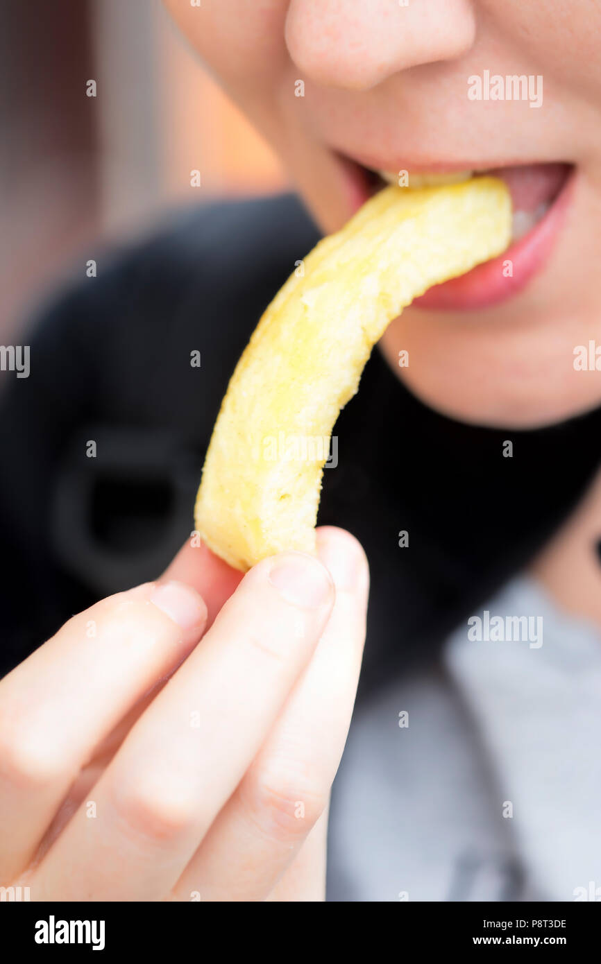 Girl salt chips fries hi-res stock photography and images - Alamy