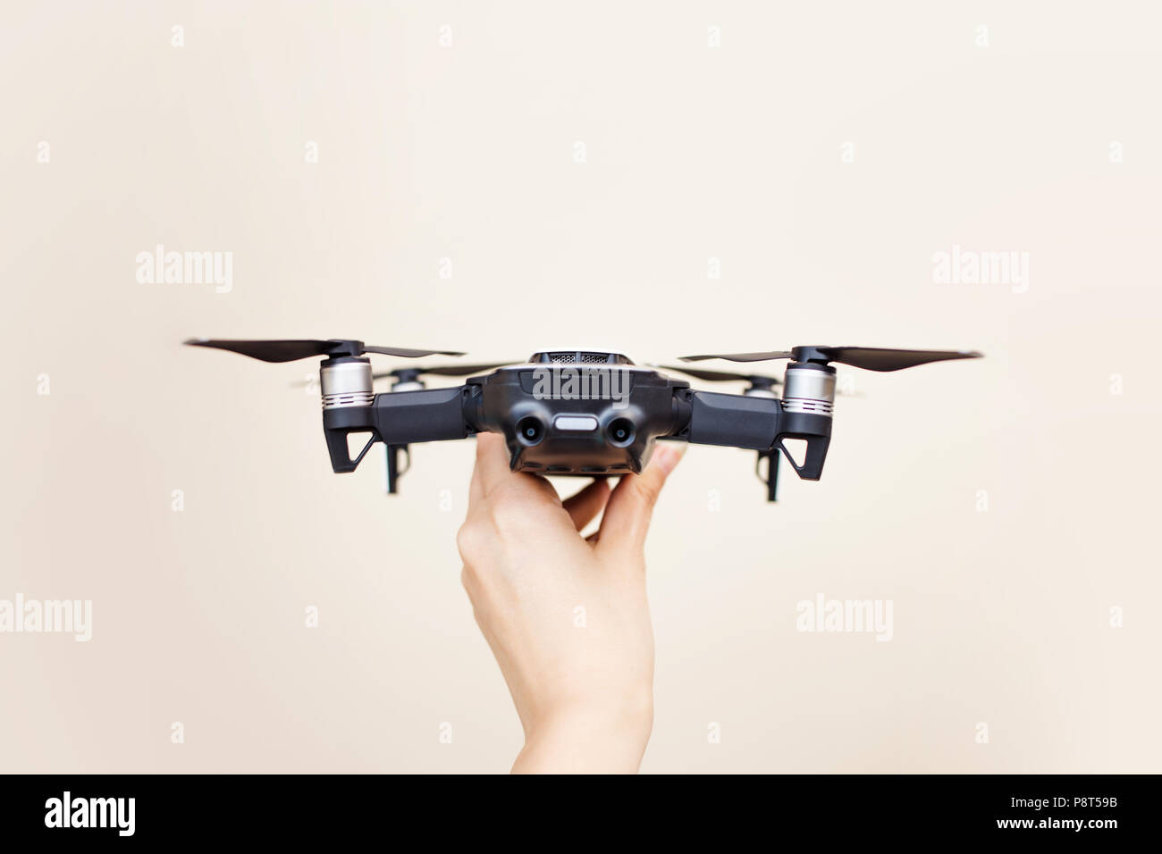 Start the drone. Launching the drone from hands. Modern small copter ...