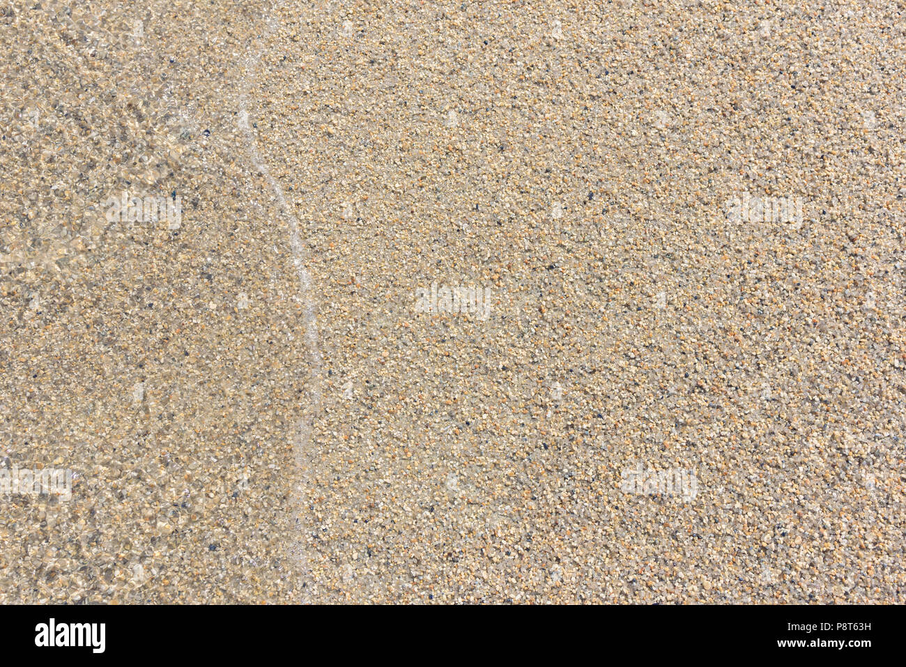 Sand texture. Sandy beach for background. Soft wave of the sea on the ...