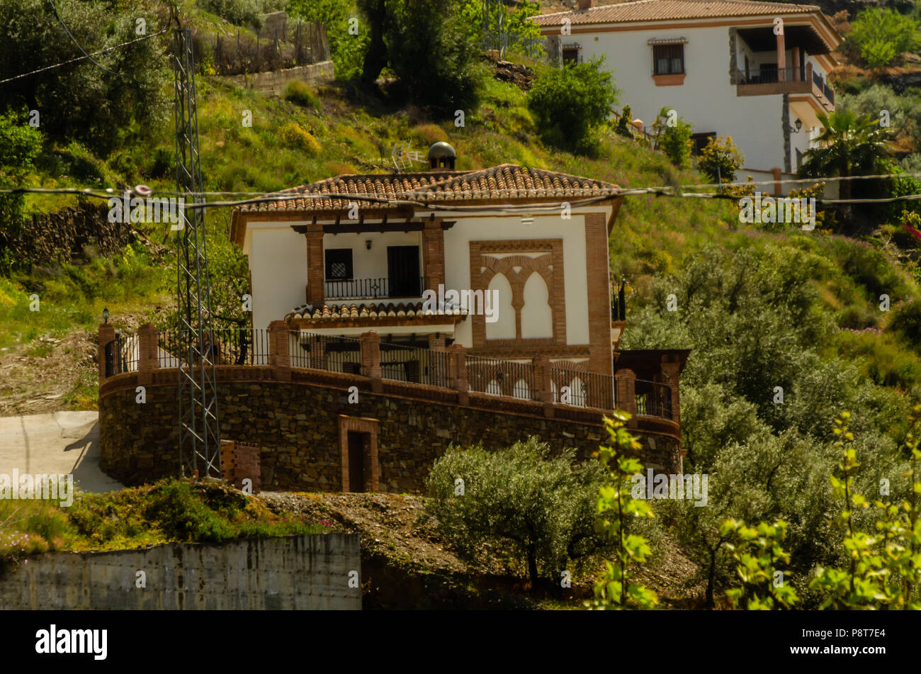 typical spanish village houses and farmland in the hills of andalusia ...