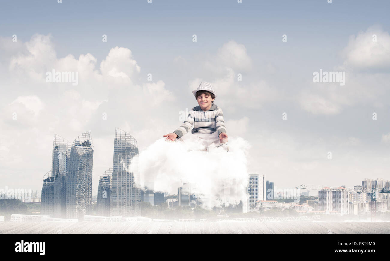 Little boy keeping mind conscious Stock Photo - Alamy