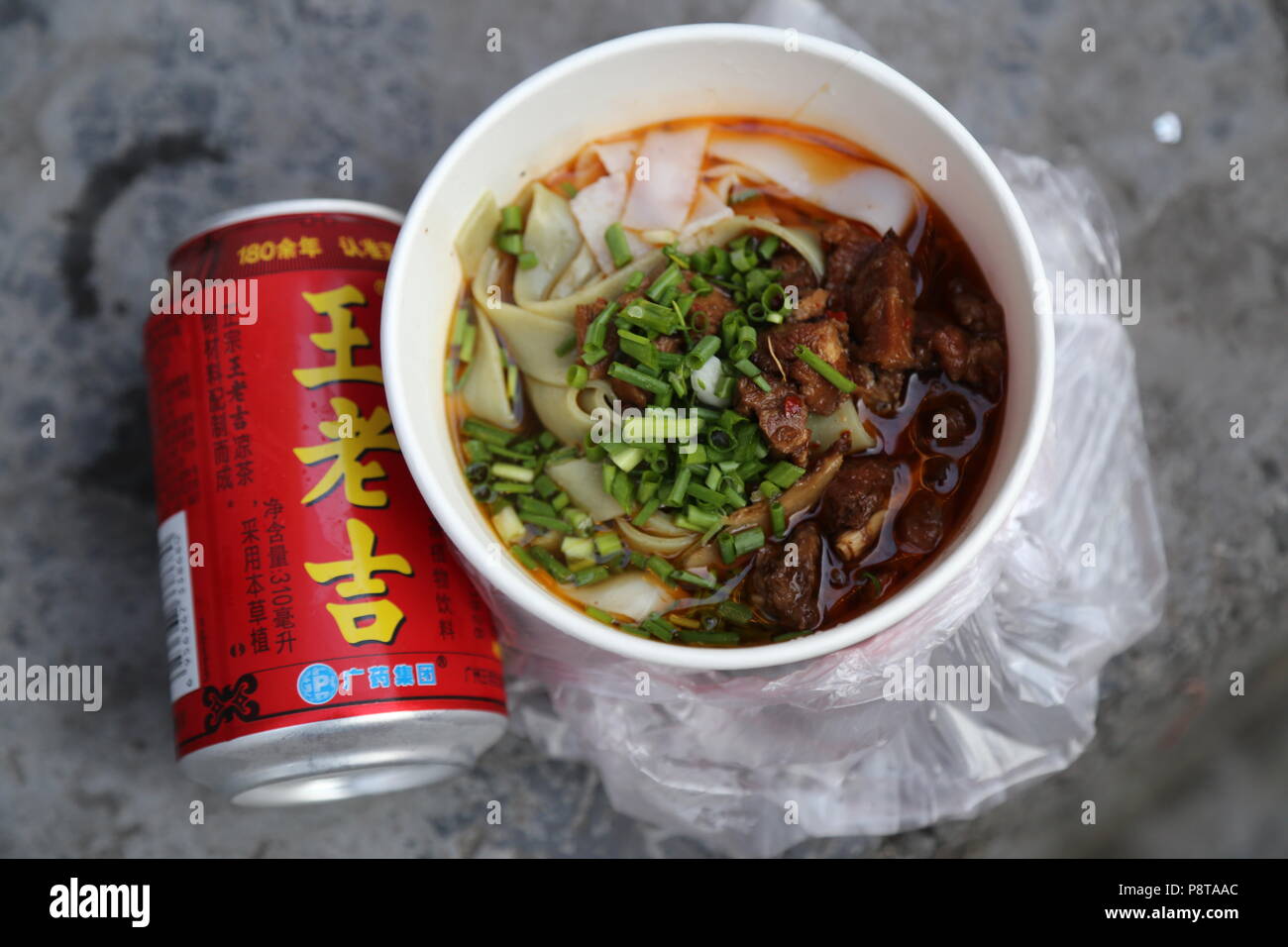 Noodles can hi-res stock photography and images - Alamy