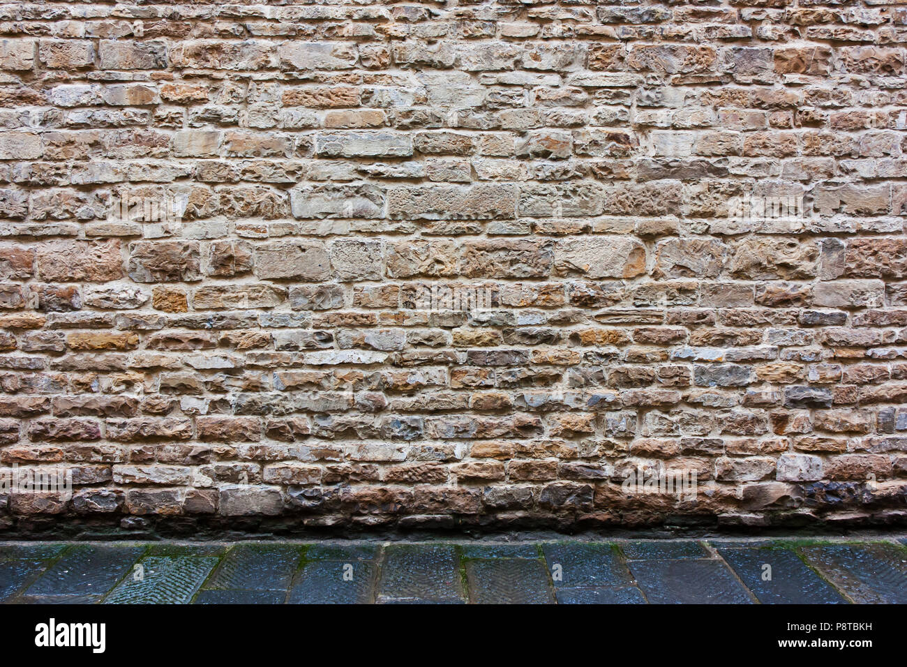 Old, medieval wall of a building in Italy. Texture of a stone. Brick ...