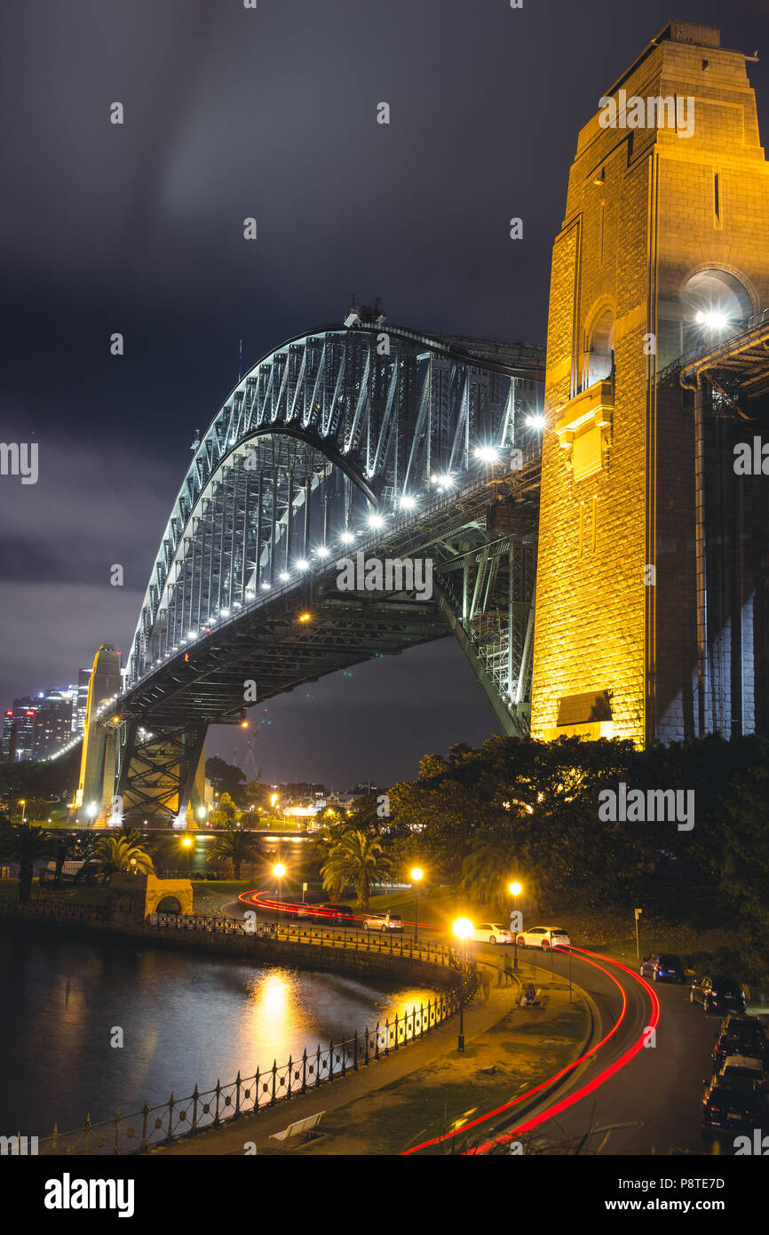 Sydney Harbour Bridge illuminated by lights at night, it is one of ...