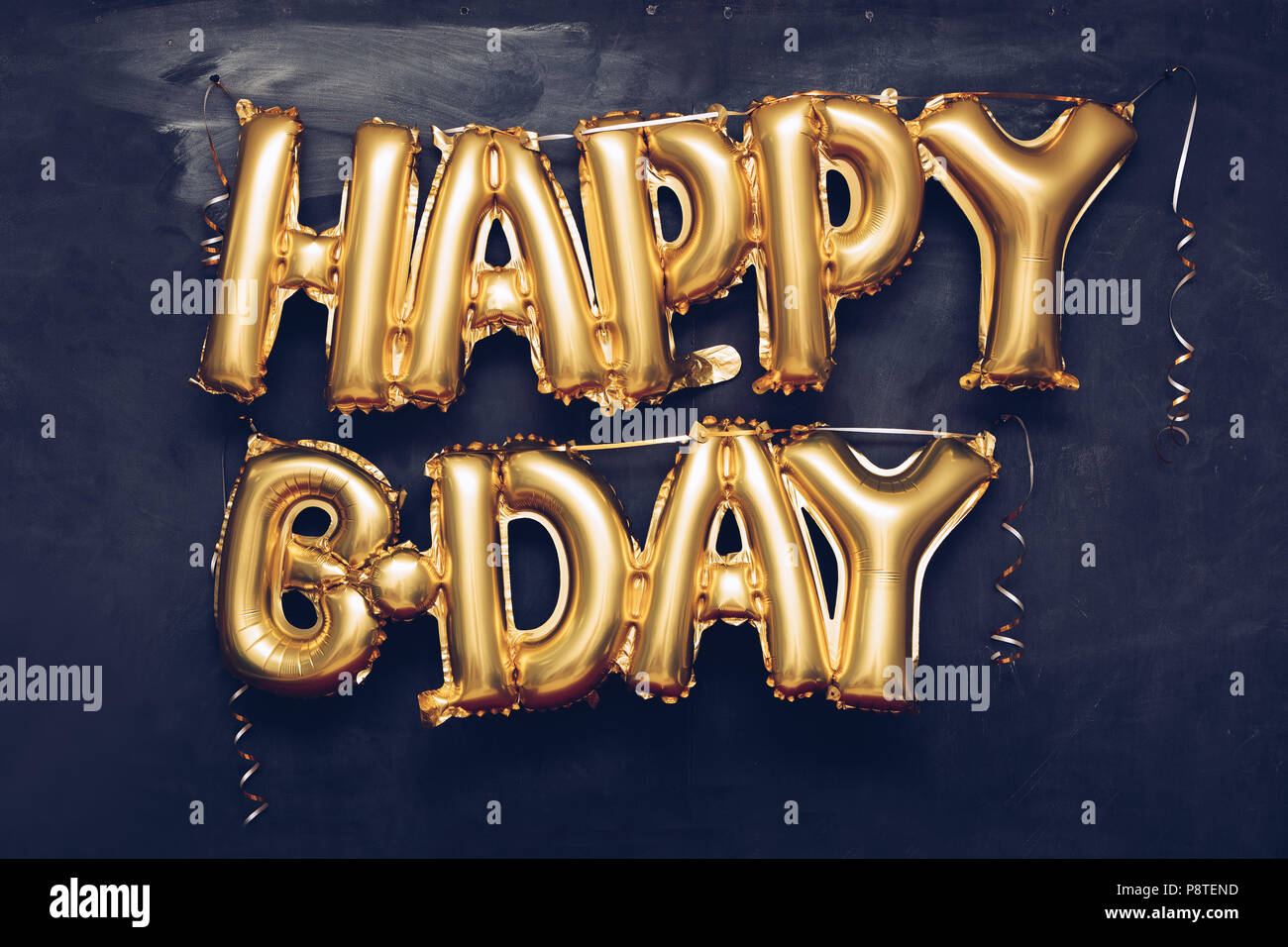 "HAPPY BIRTHDAY" - balloons hanging on a chalkboard Stock Photo - Alamy