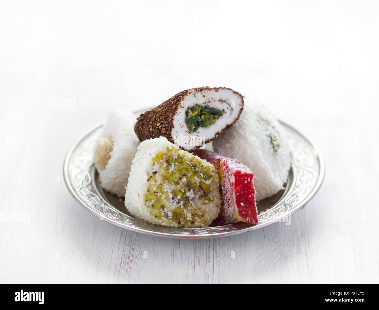 Traditional Turkish sweets lukum on silver saucer Stock Photo - Alamy