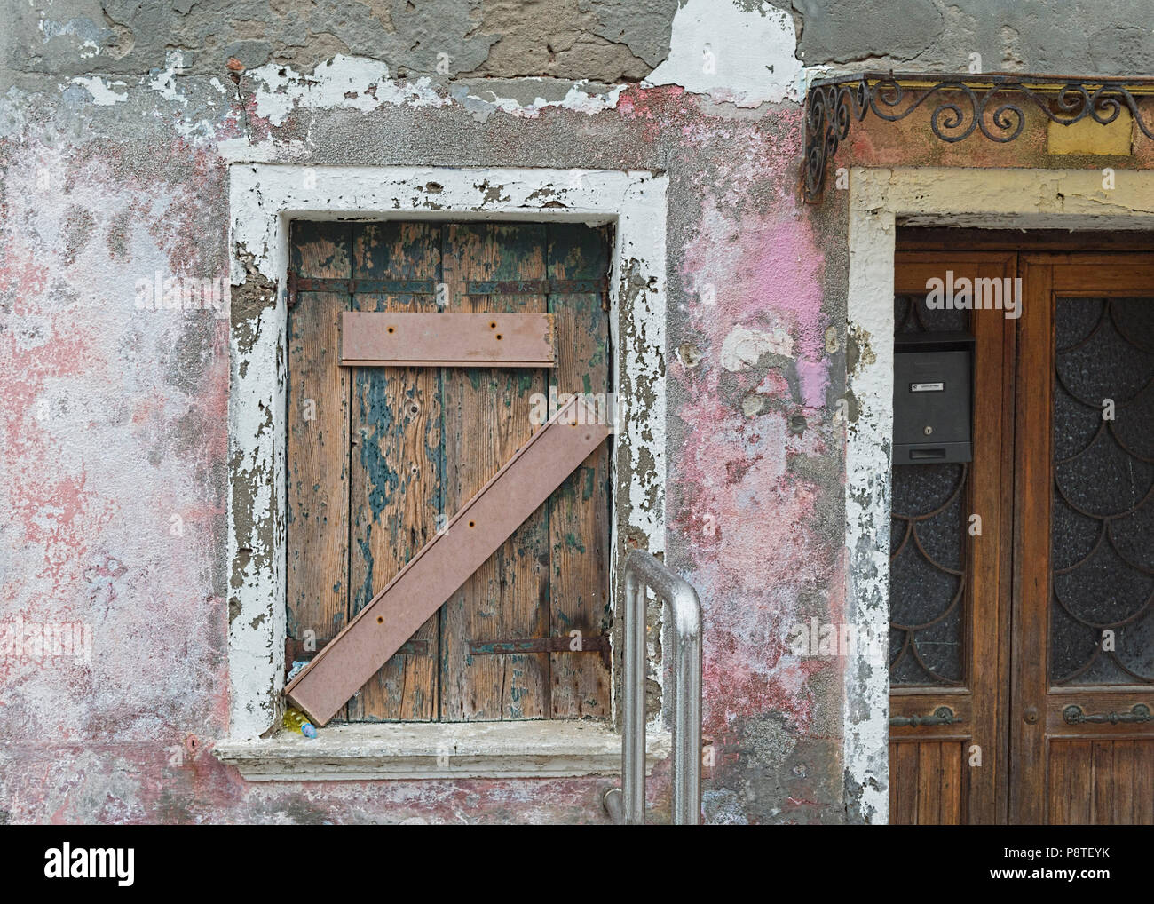 Flaking and decaying paint on buildings, Burano Italy Stock Photo - Alamy