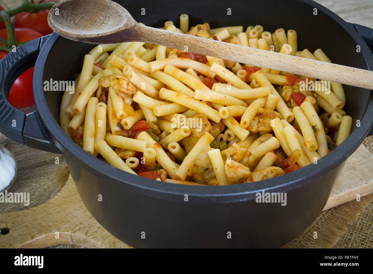 pan-fried pasta and pork à la provençale Stock Photo - Alamy