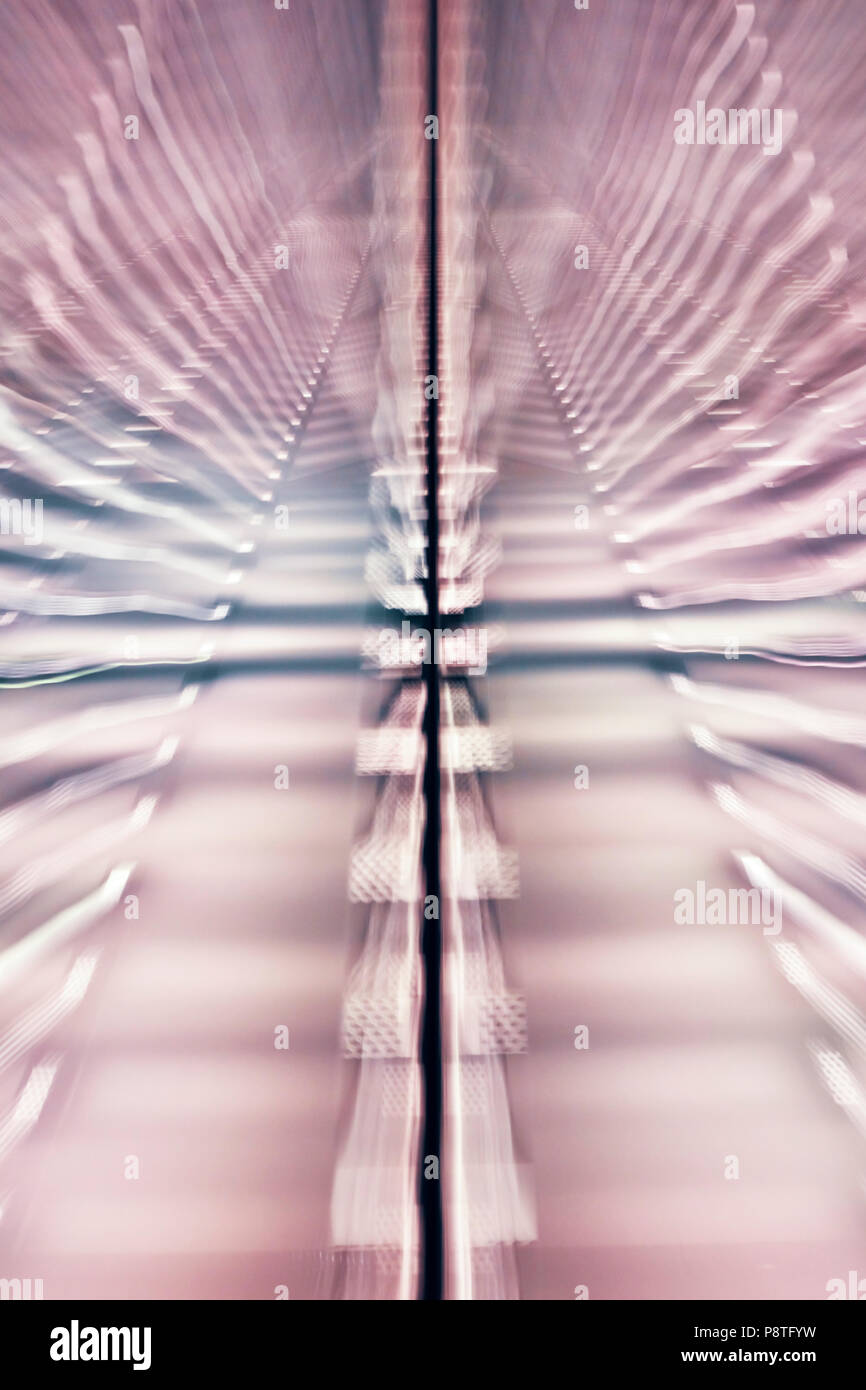 Abstract background made by zooming camera pointed at city lights at ...