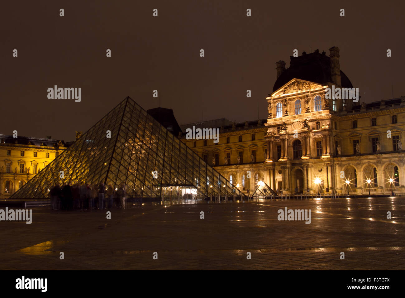 Louvre museum at night Paris tourism Stock Photo - Alamy