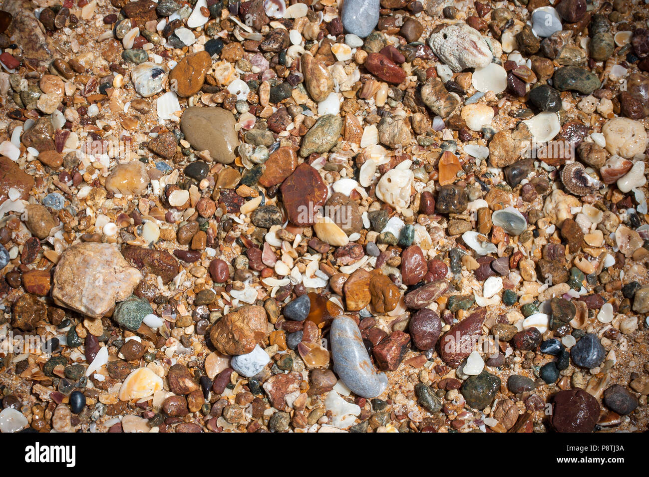Sea stones background Stock Photo - Alamy