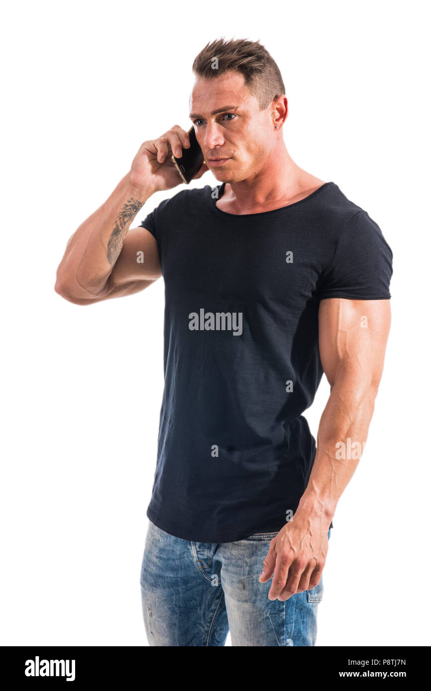 Male bodybuilder talking on cellphone Stock Photo - Alamy