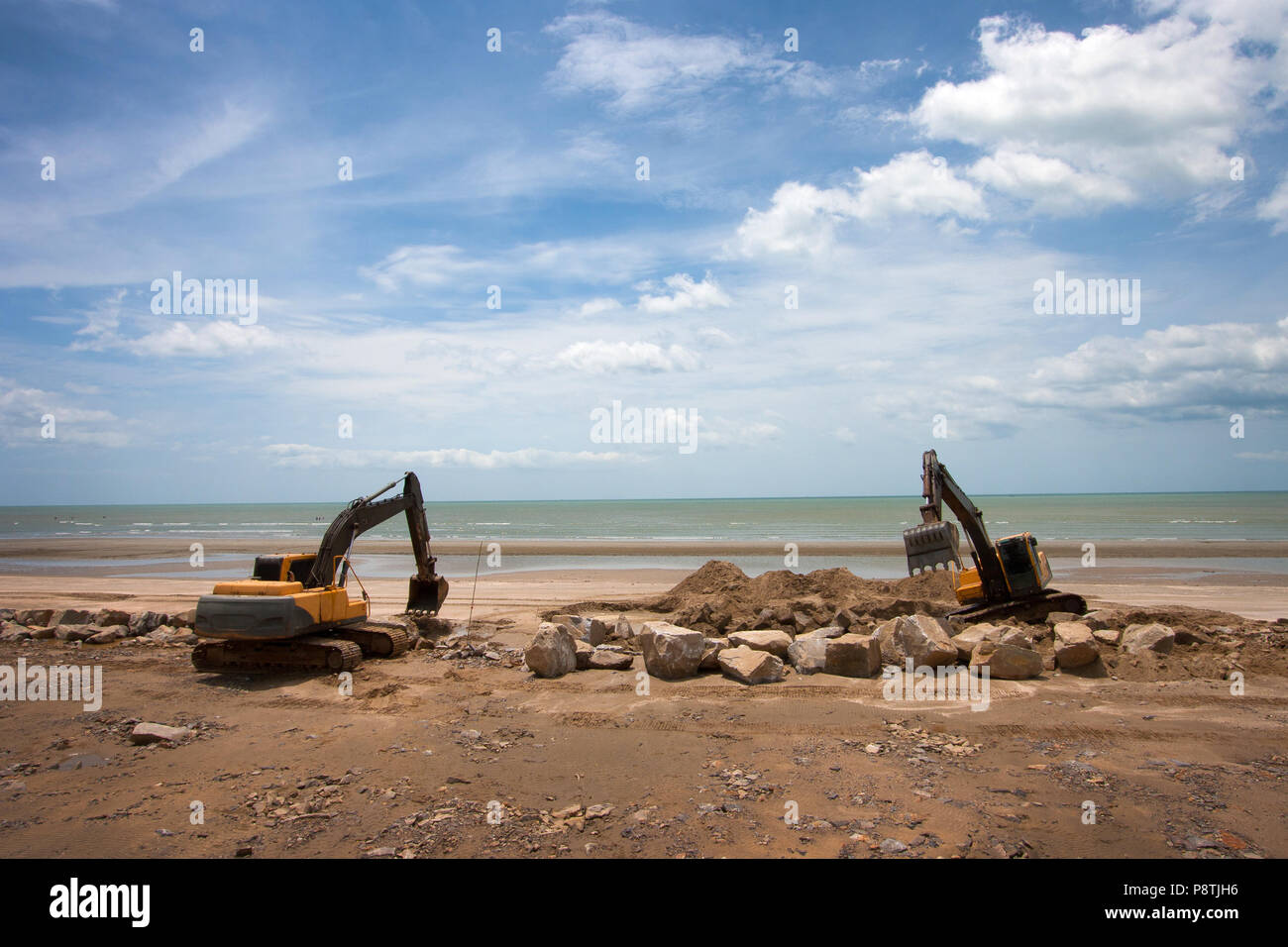 excavator machine doing earthmoving work at sand quarry Stock Photo - Alamy