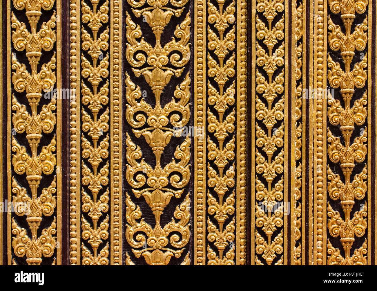 Thai art wall pattern in temple Stock Photo - Alamy