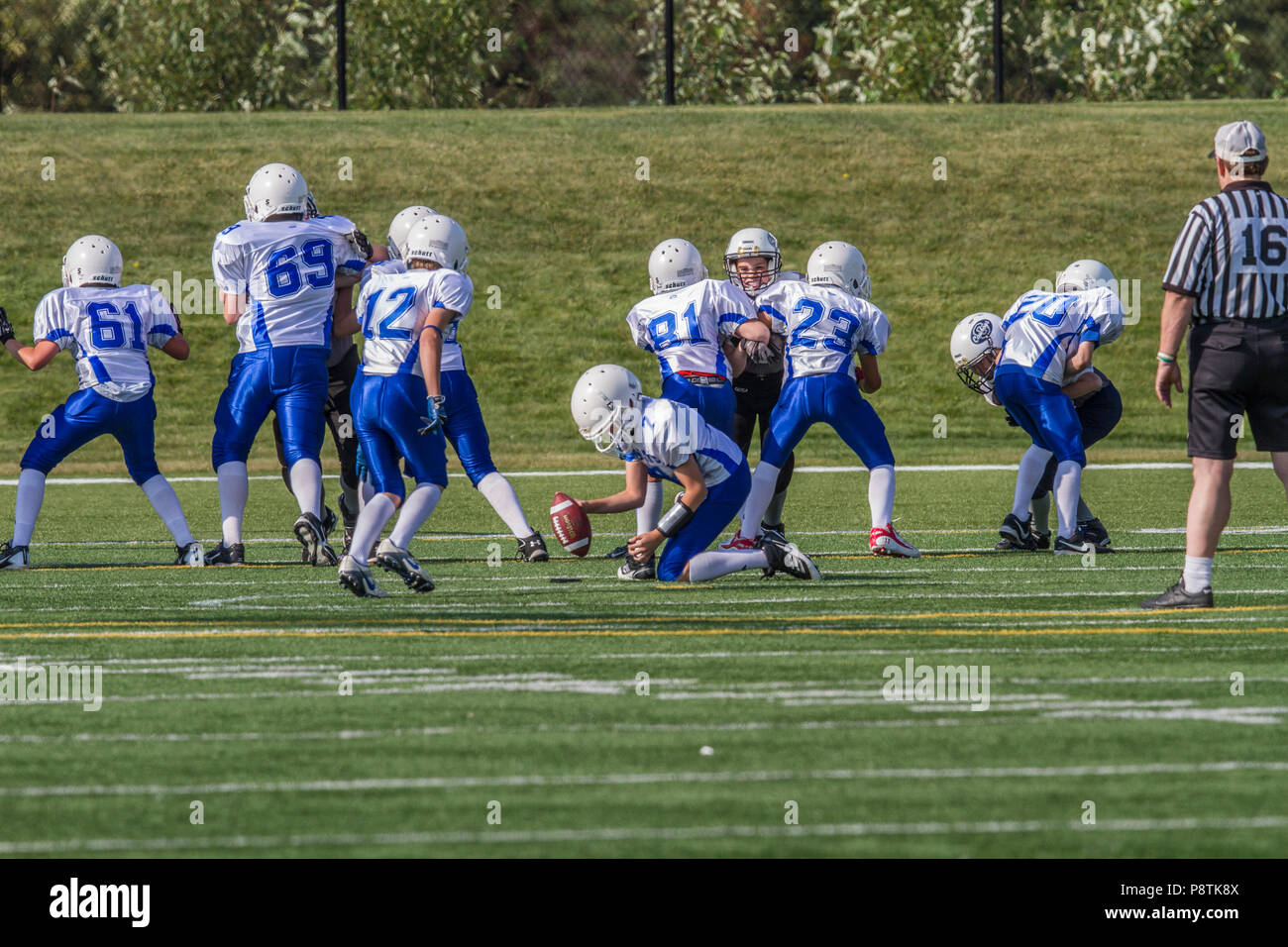 Dramatic, colorful action photo's of Boys Bantam football in Calgary ...
