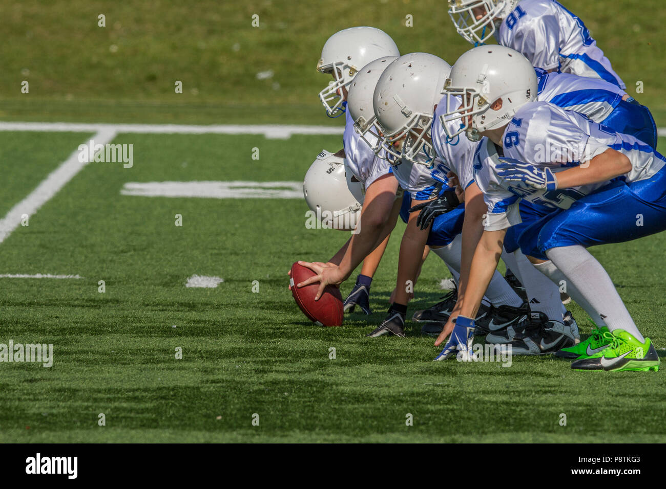 Dramatic, colorful action photo's of Boys Bantam football in Calgary ...