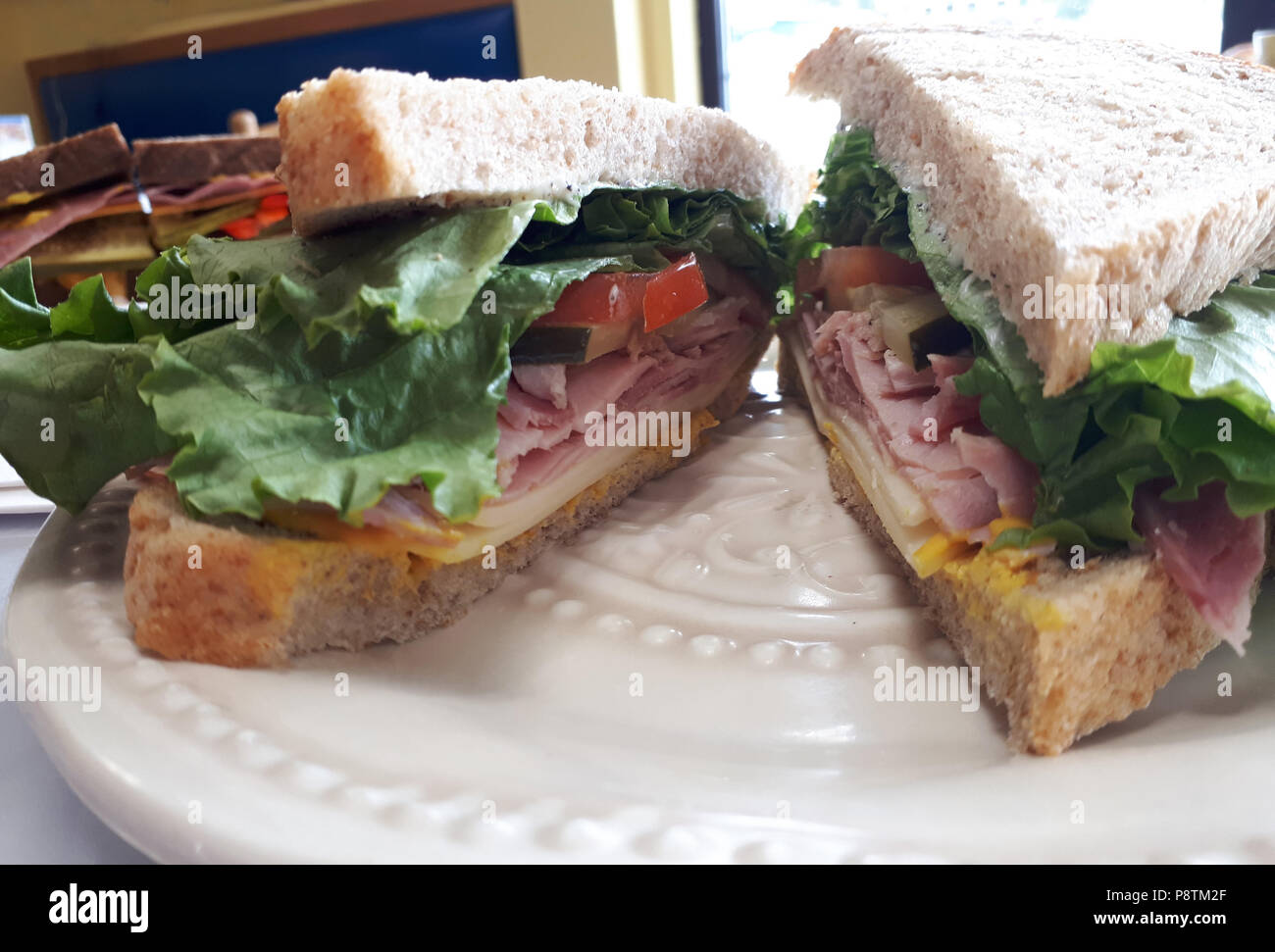 Delicious looking ham and cheese sandwich on a restaurant plate Stock ...
