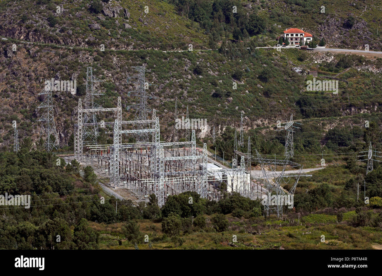 High voltage electricity complex near a barrage Stock Photo - Alamy