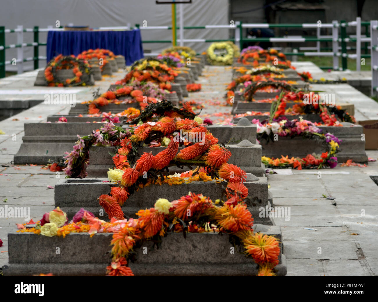 Budgam, Jammu And Kashmir, India. 13th July, 2018. Wreaths can be seen ...