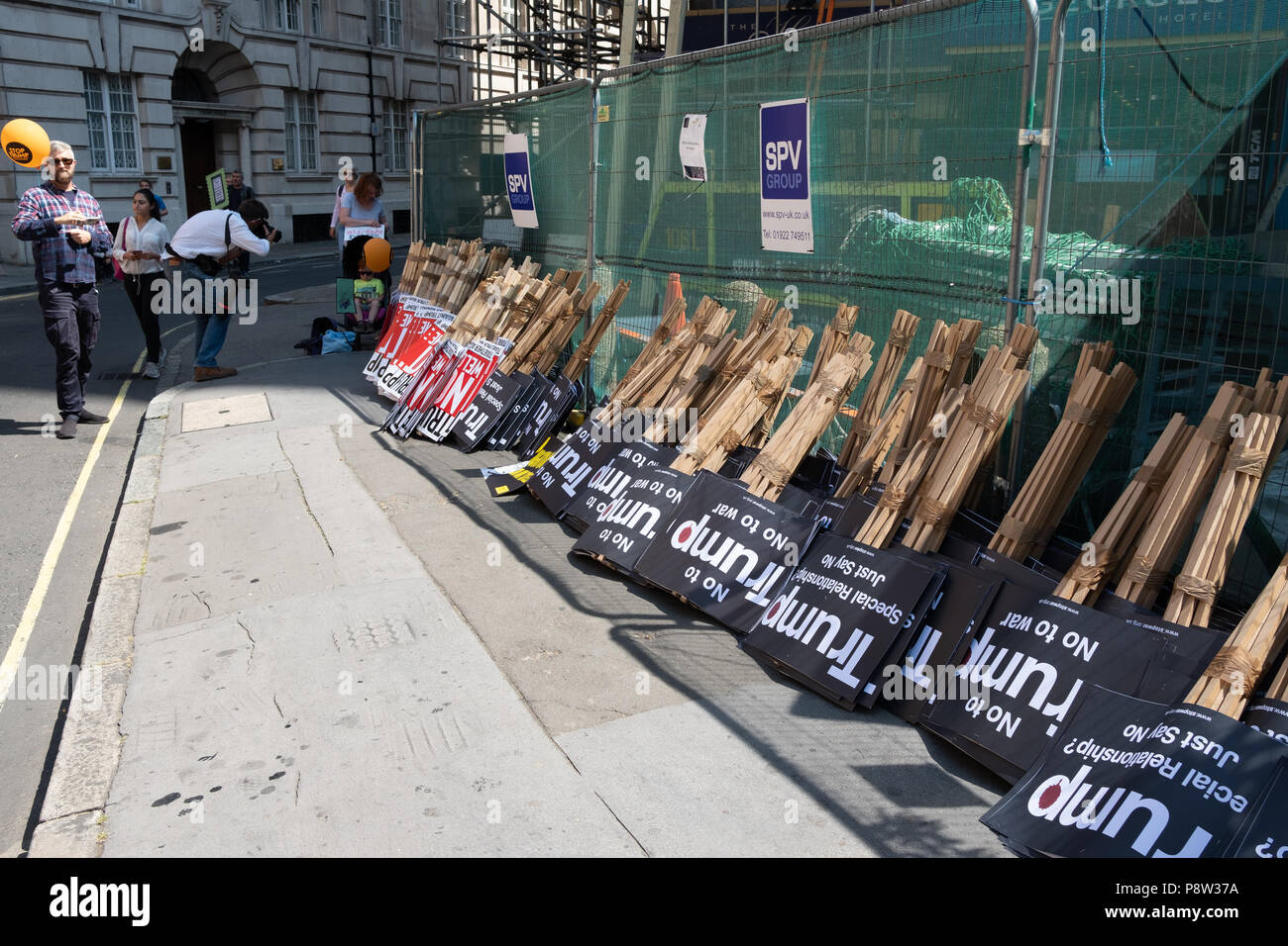 London, UK. 13 July 2018. Trump demonstration. Signs are made ready for ...