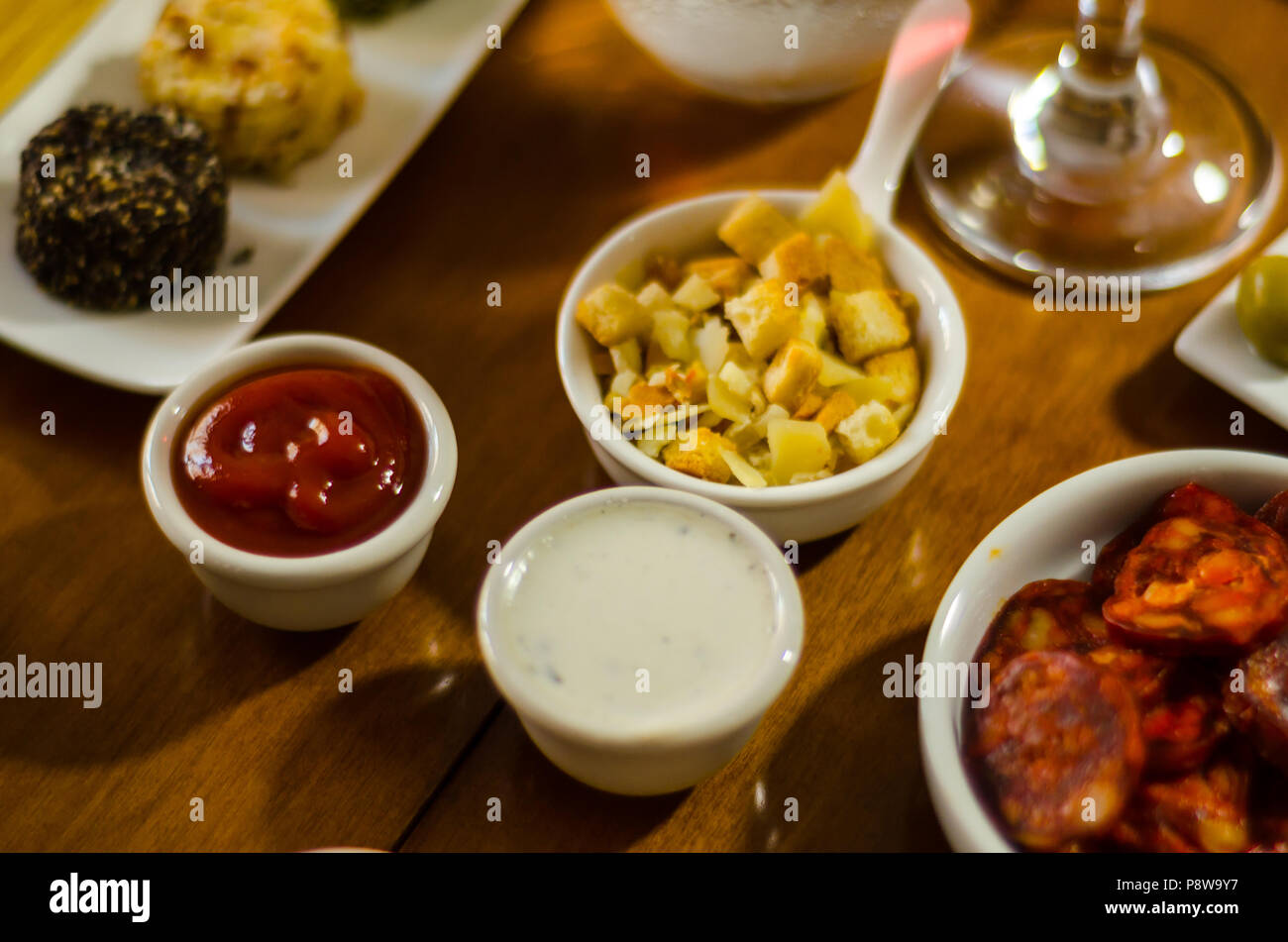 Set with different appetizers in small portions, healthy and delicious ...