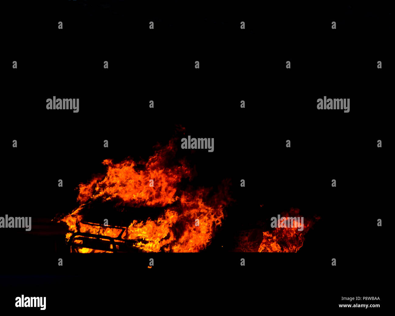 burning car on the road at night, a tragic accident ending with the ...