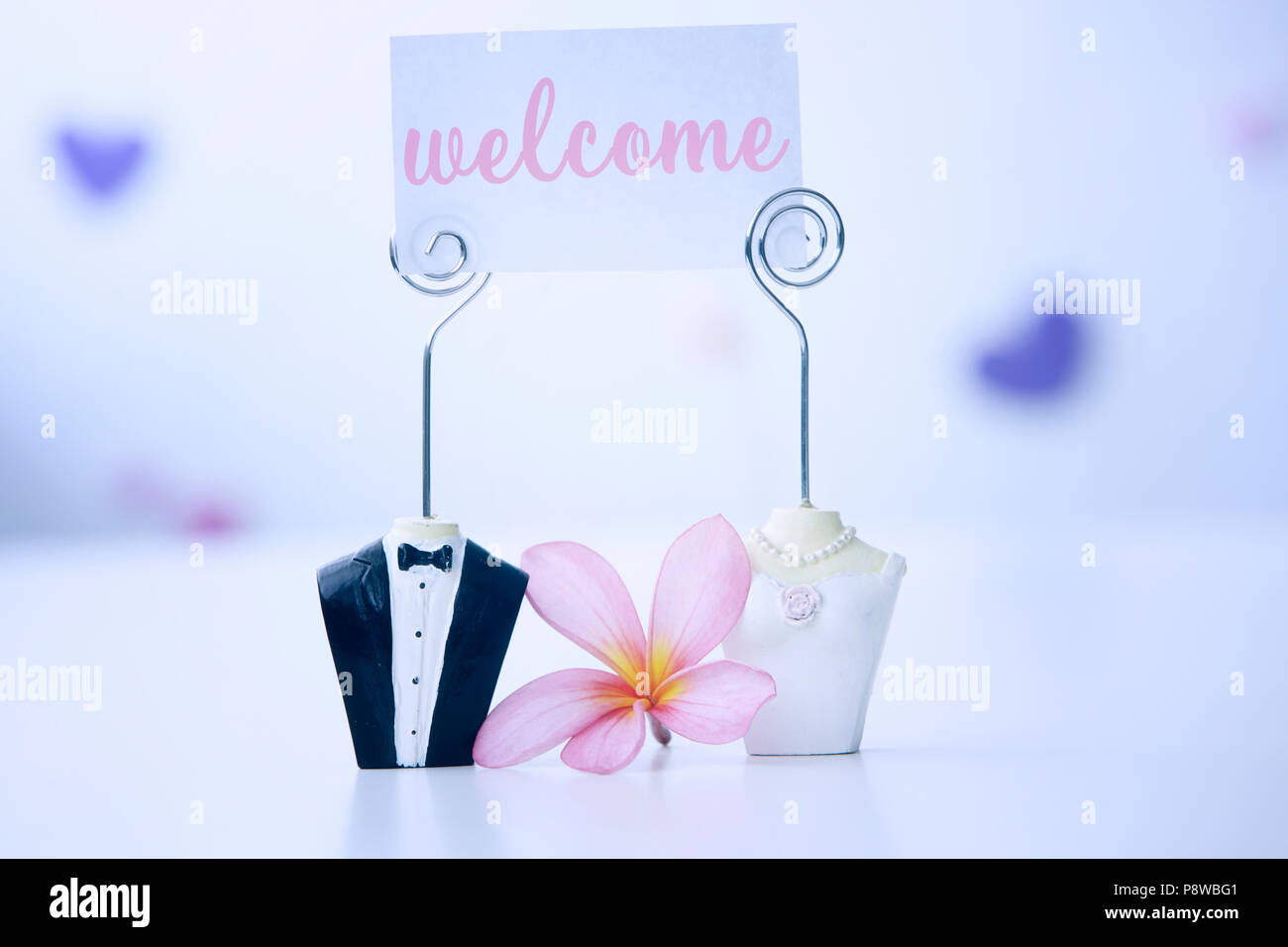bride and groom Figure Card Holder with welcome note Stock Photo - Alamy