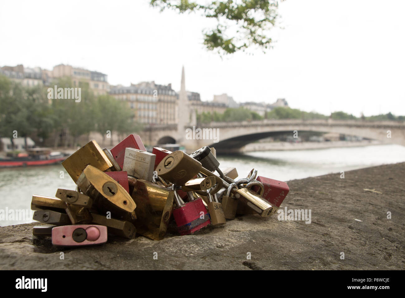 Love locks with Paris River Seine and bridge background, France Stock ...