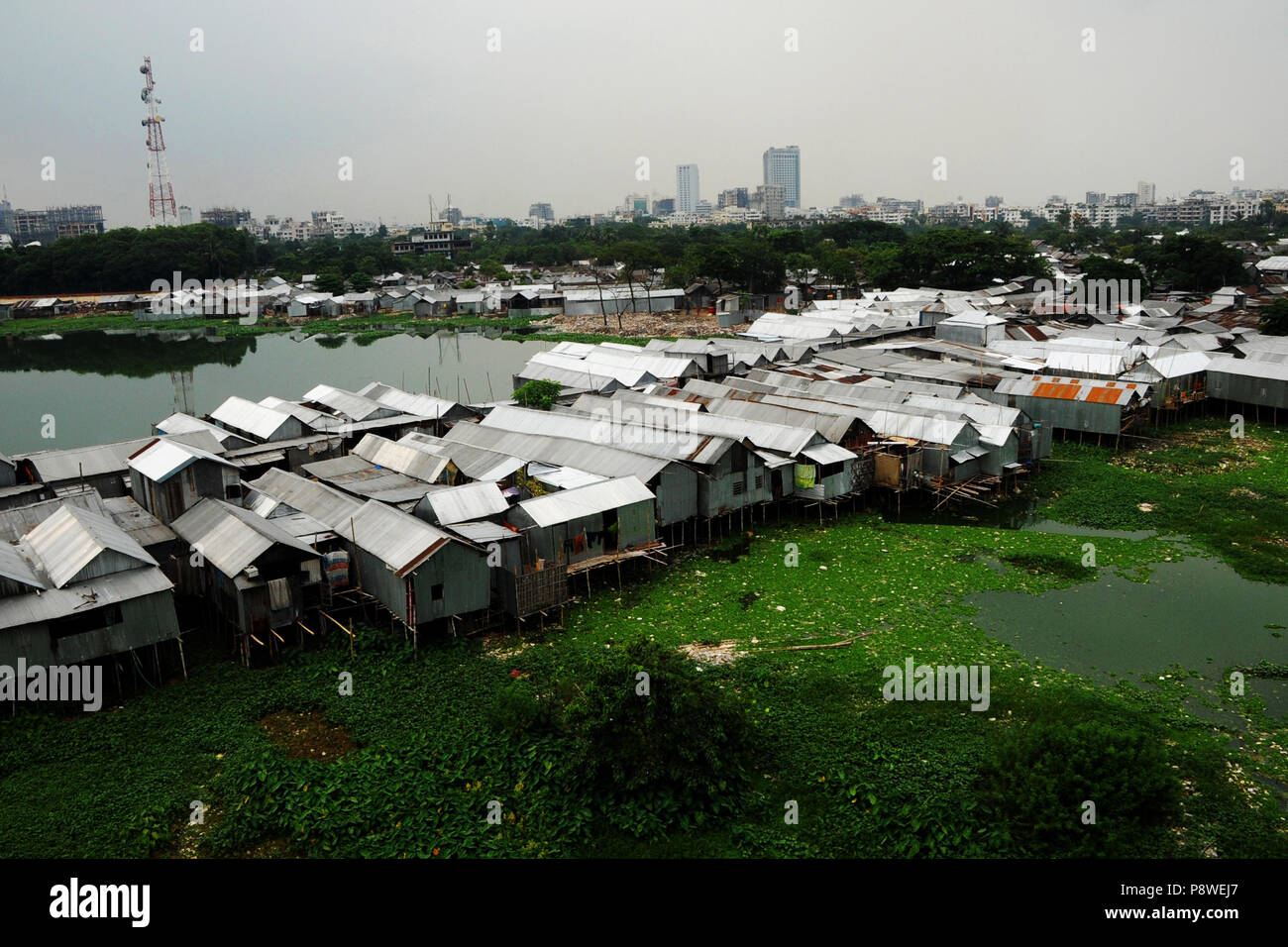 A top view of Korail Slum is located beside the Gulshan-Banani Lake in ...