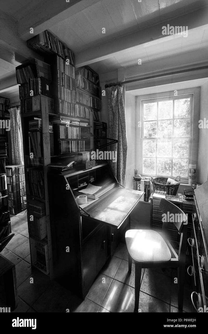 Farm house interior, room with desk chair and sunlit window (mono Stock ...