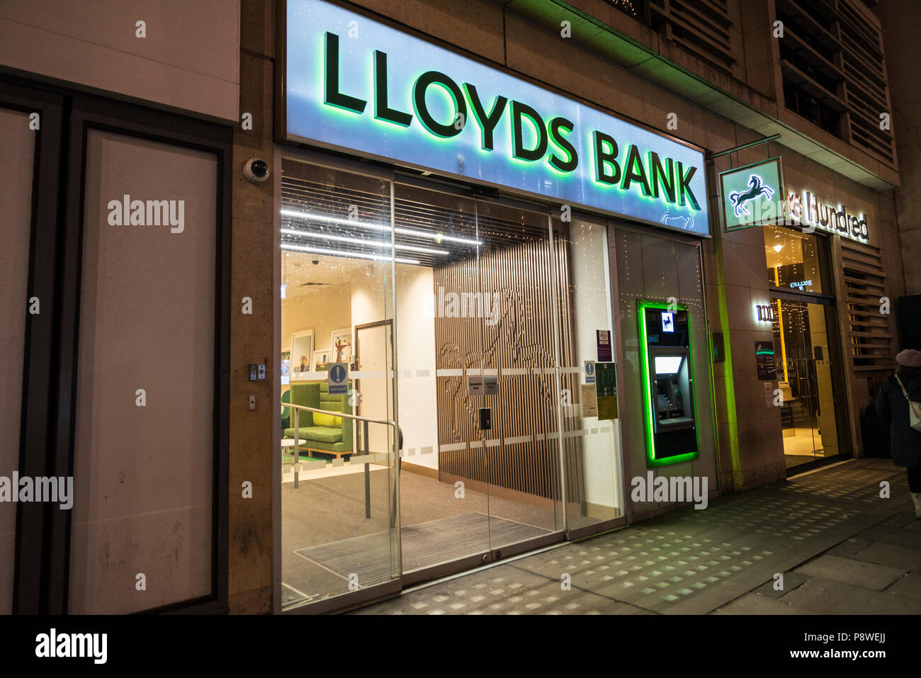 London, United Kingdom - January 3, 2017: Bank branch and ATM of Lloyds ...