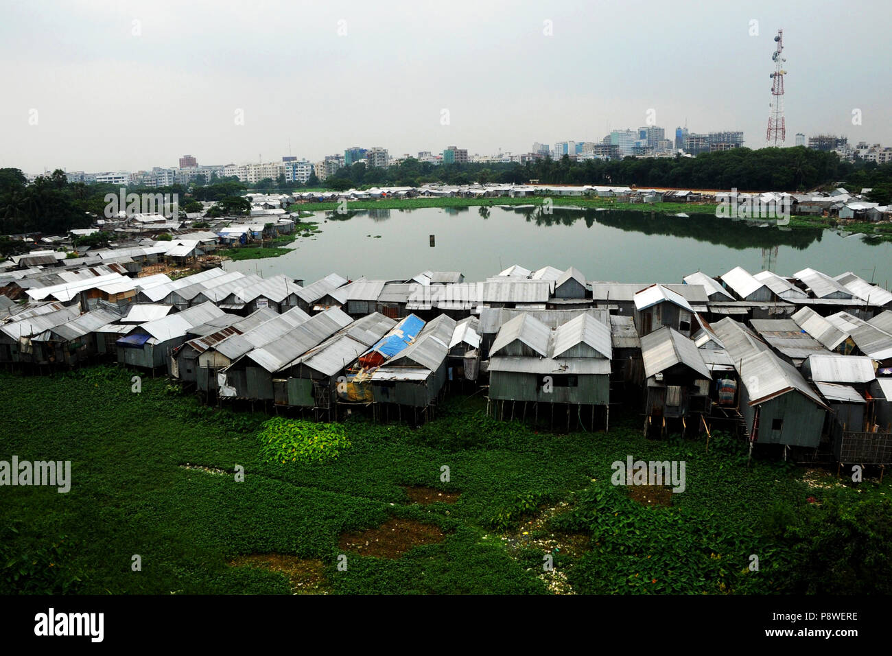 A top view of Korail Slum is located beside the Gulshan-Banani Lake in ...