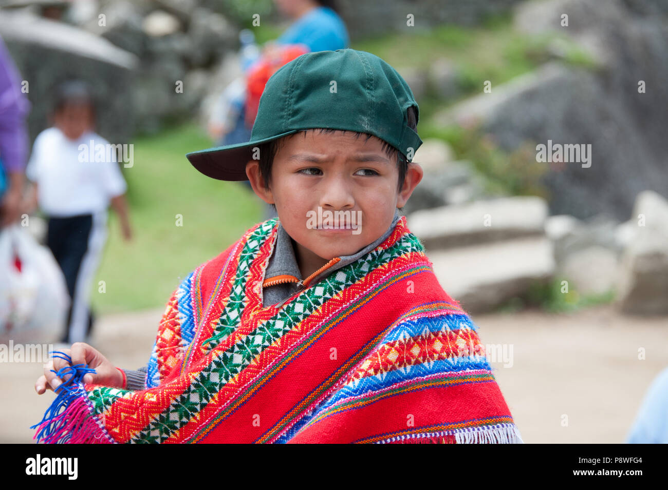 Local children of Machu Picchu, Peru South America Stock Photo - Alamy