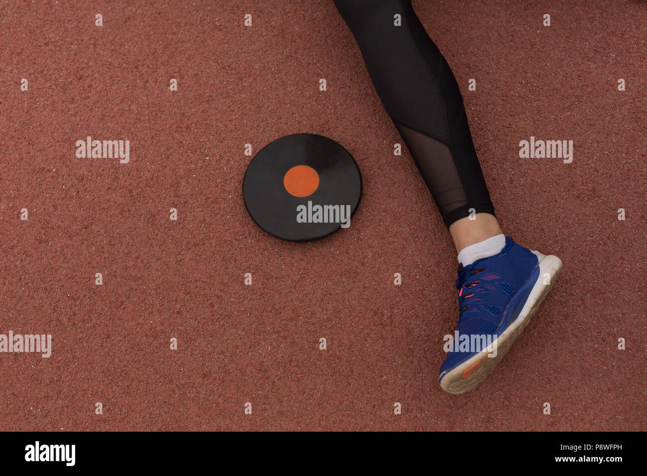 Female athlete with discus throw Stock Photo - Alamy