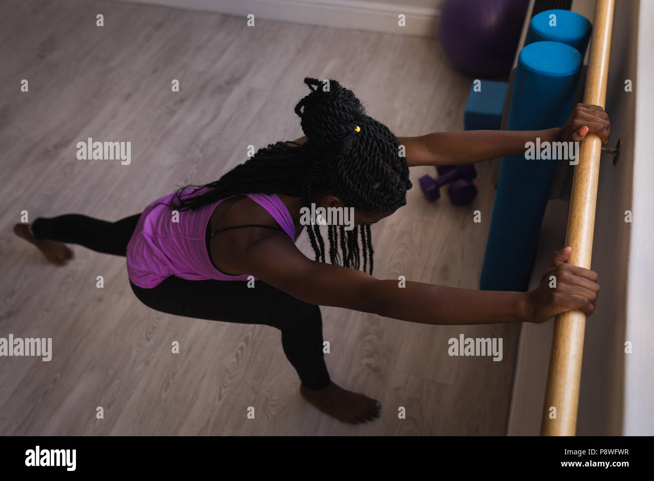 Woman performing barre exercise Stock Photo - Alamy Woman performing barre exercise Stock Photo - Alamy
