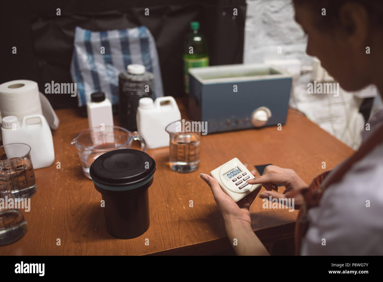 Female photographer using electronic device Stock Photo - Alamy