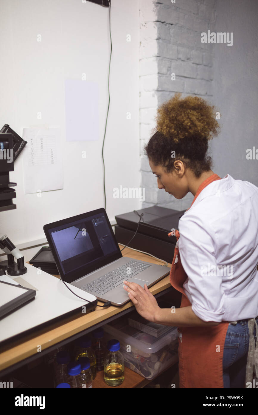 Female photographer developing photos Stock Photo - Alamy