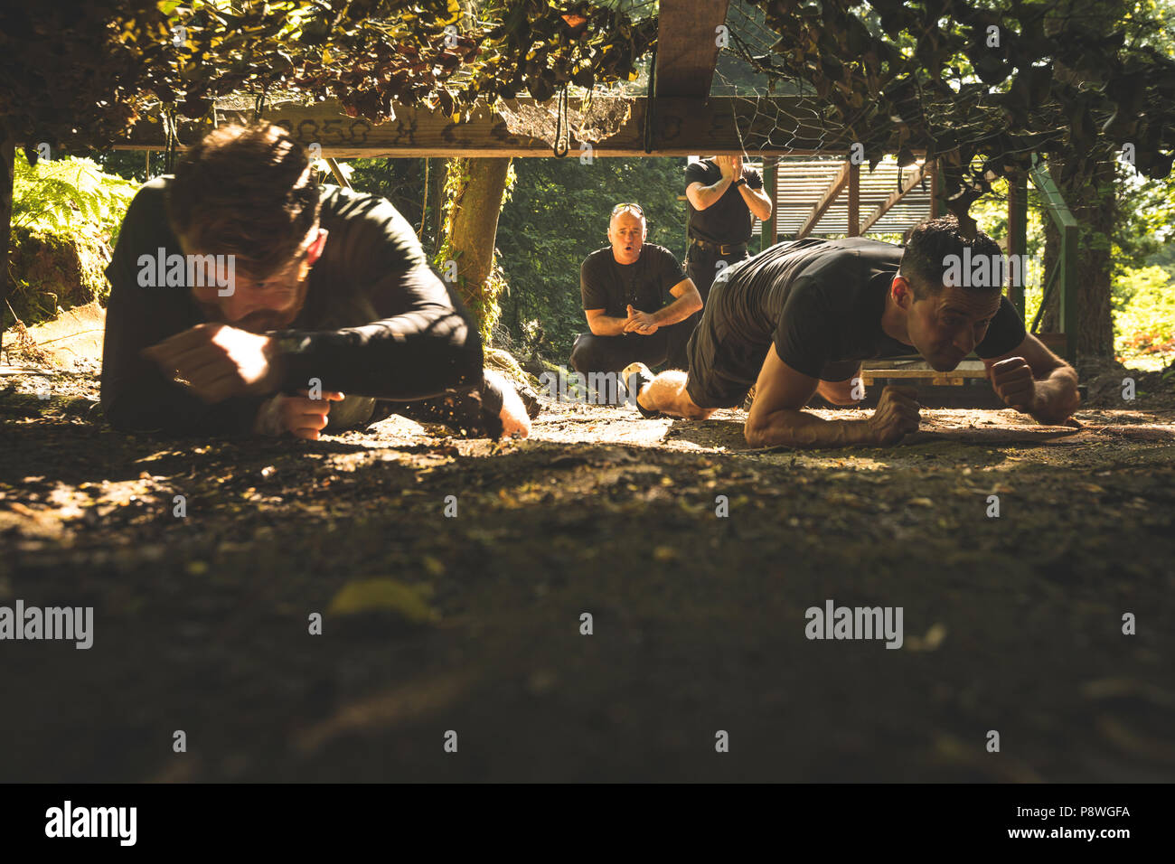 Crawling under net hi-res stock photography and images - Alamy