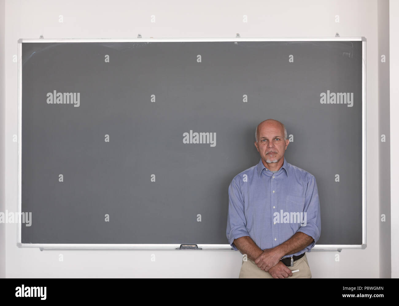 Male teacher standing facing camera hi-res stock photography and images ...