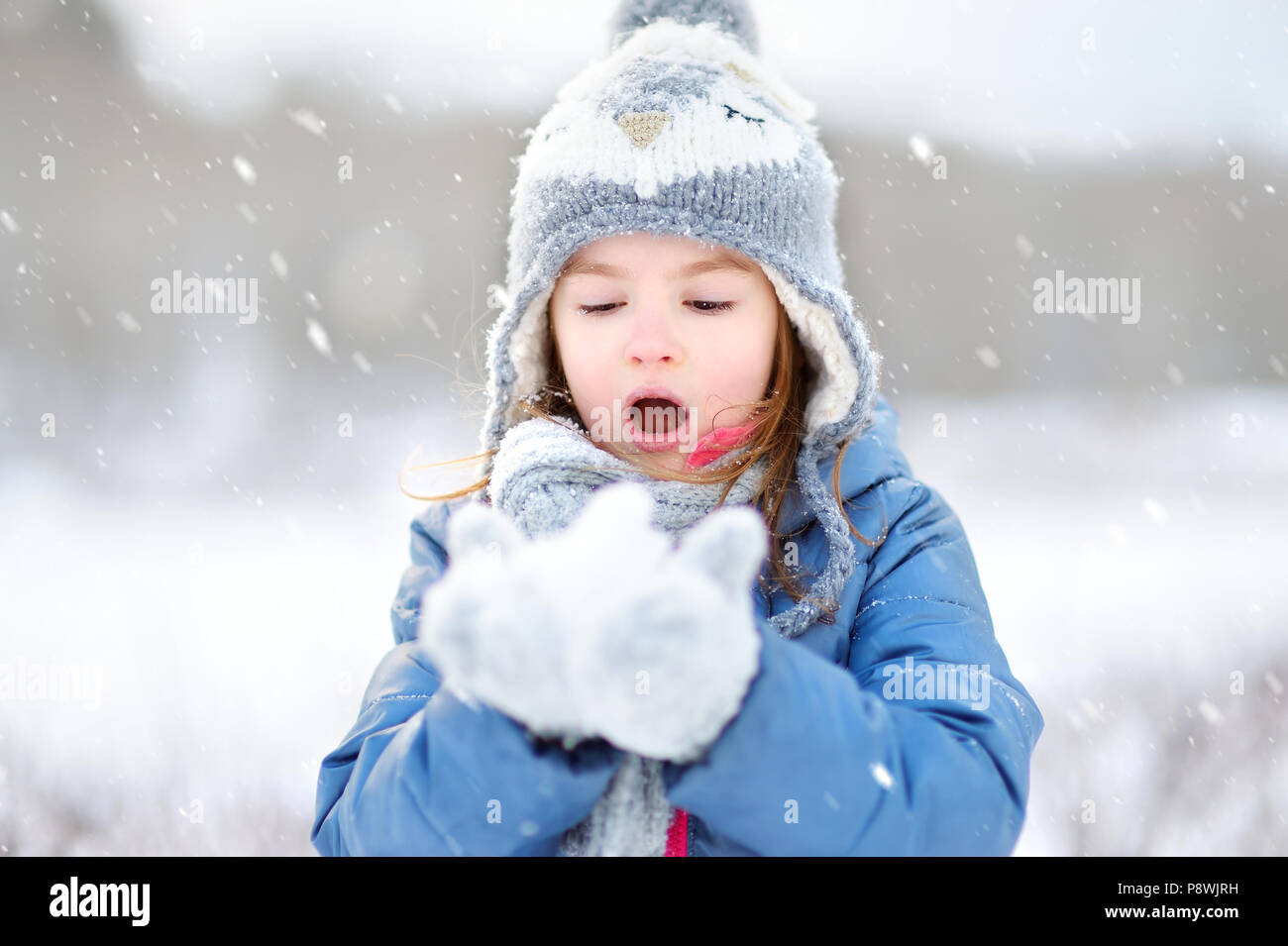 Girl Catching Snowflakes Tongue High Resolution Stock Photography and ...