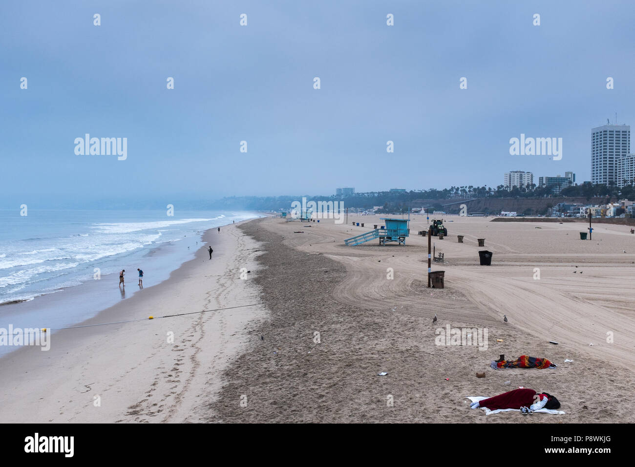 Homeless People Sleep on Santa Monica Beach During the Early Hours of ...