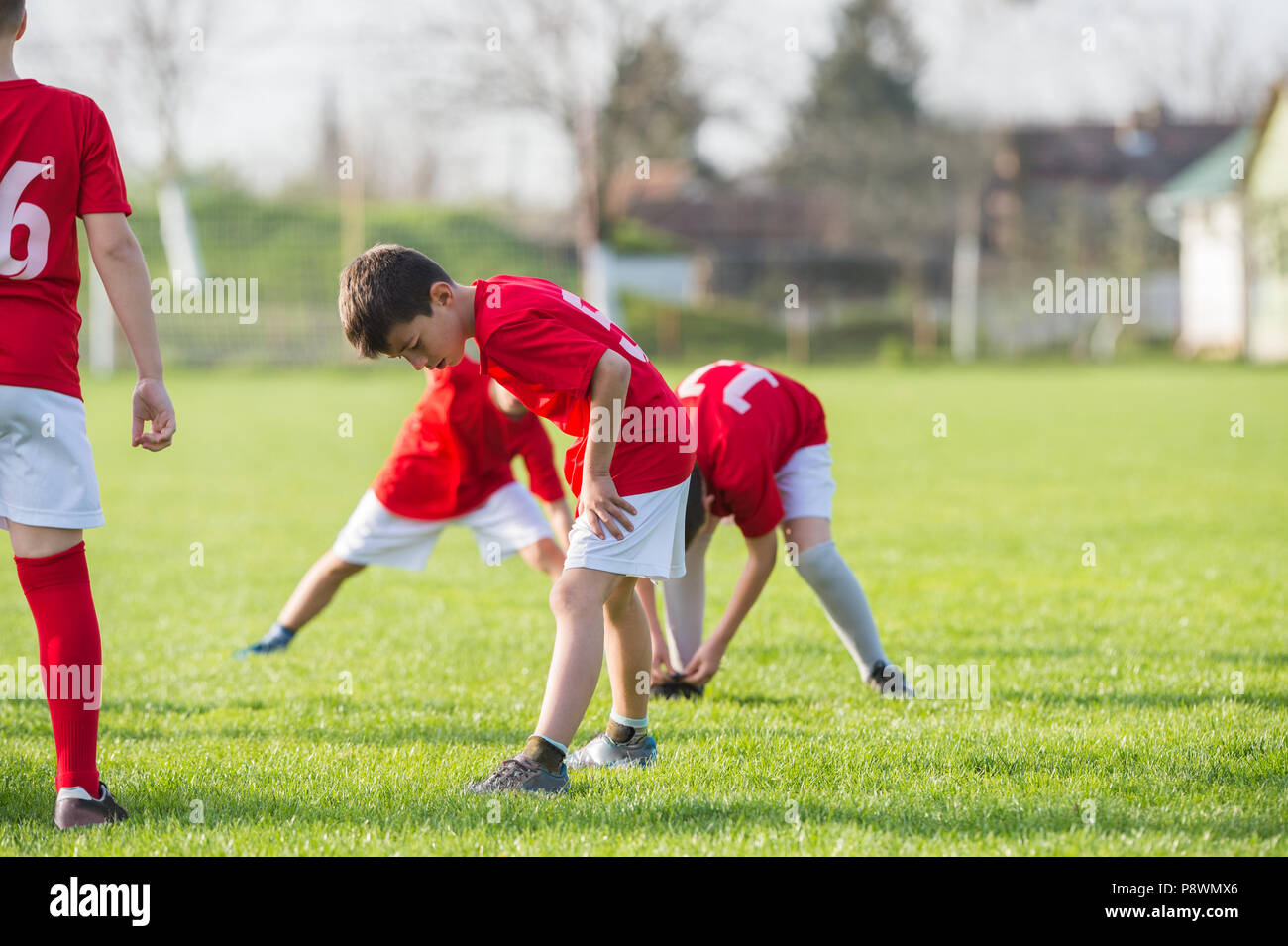 Soccer training for kids in football field Stock Photo - Alamy