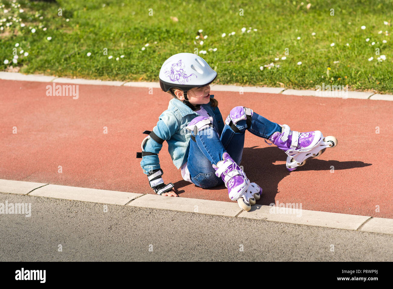 girl falling from the roller Stock Photo - Alamy