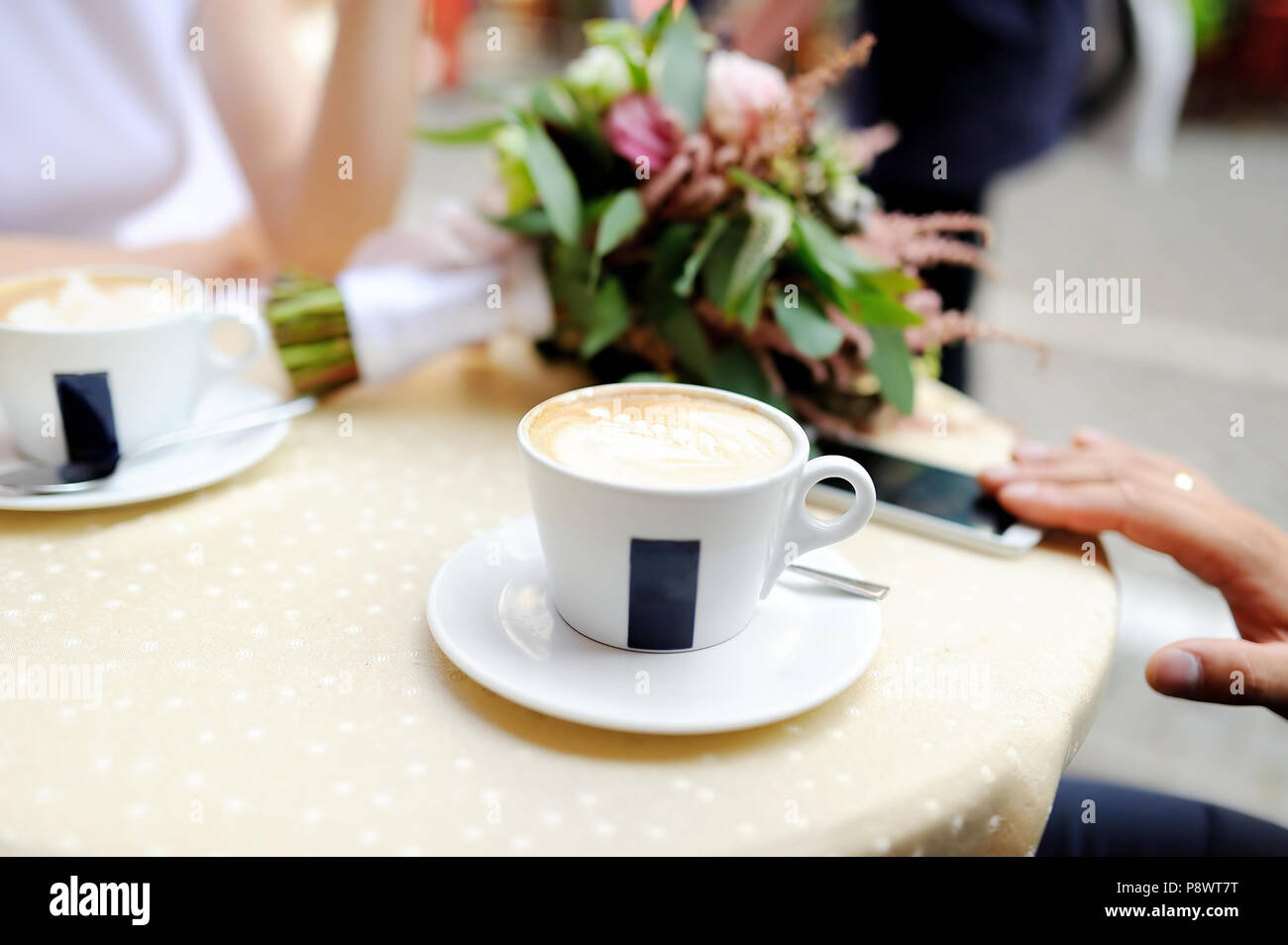 Bride and groom drinking coffee on a wedding day Stock Photo - Alamy