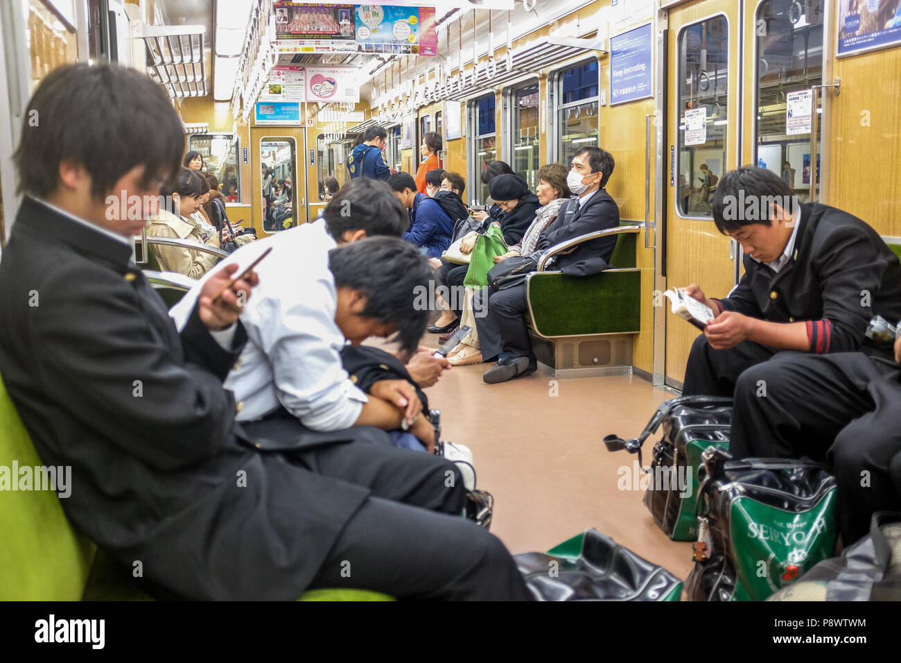 Commuters on Hankyu Railway Kobe line. This is one of three major ...