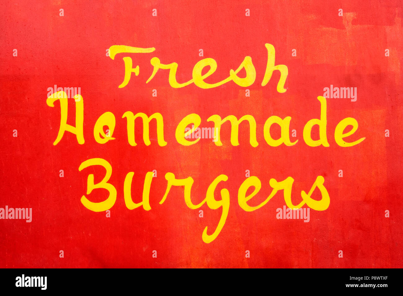 Handpainted sign that says Fresh homemade burgers Stock Photo - Alamy